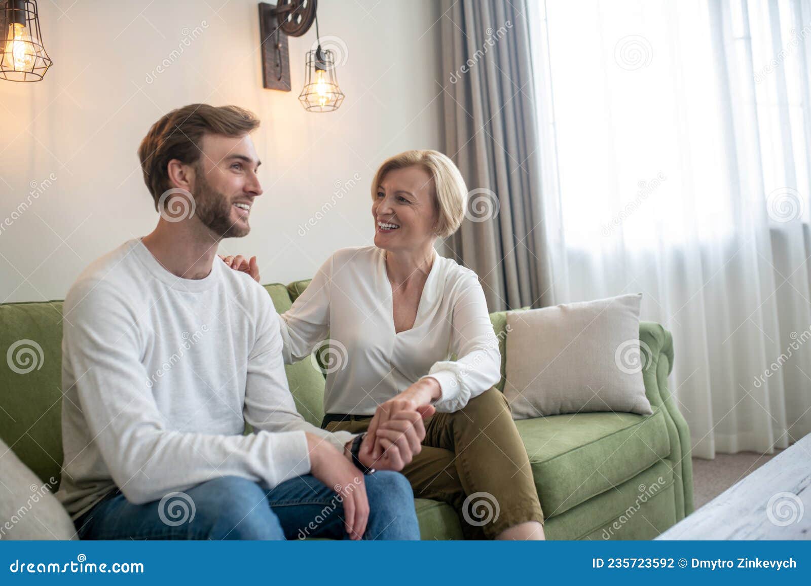 Son Visiting His Mom and Both Looking Happy Stock Photo - Image of ...