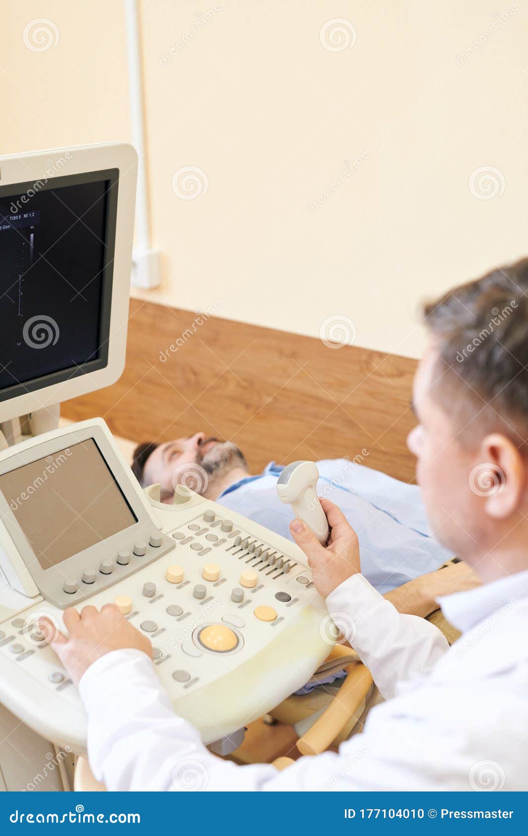 Sonographer Examining Patient Stock Photo - Image of occupation ...