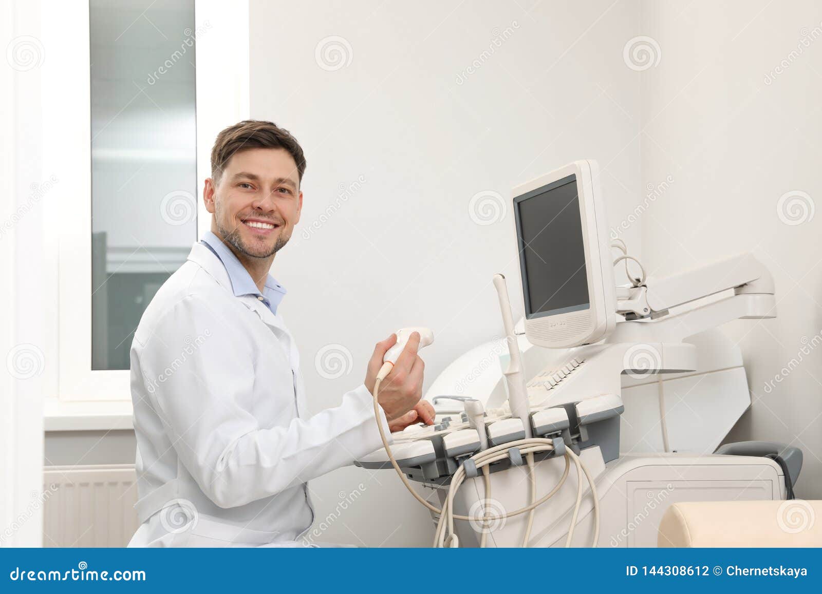 Sonographer Operating Modern Ultrasound Machine Stock Photo - Image of ...