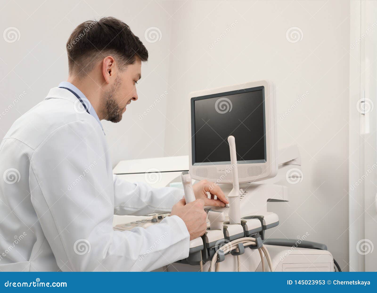 Sonographer Operating Modern Ultrasound Machine Stock Image - Image of ...