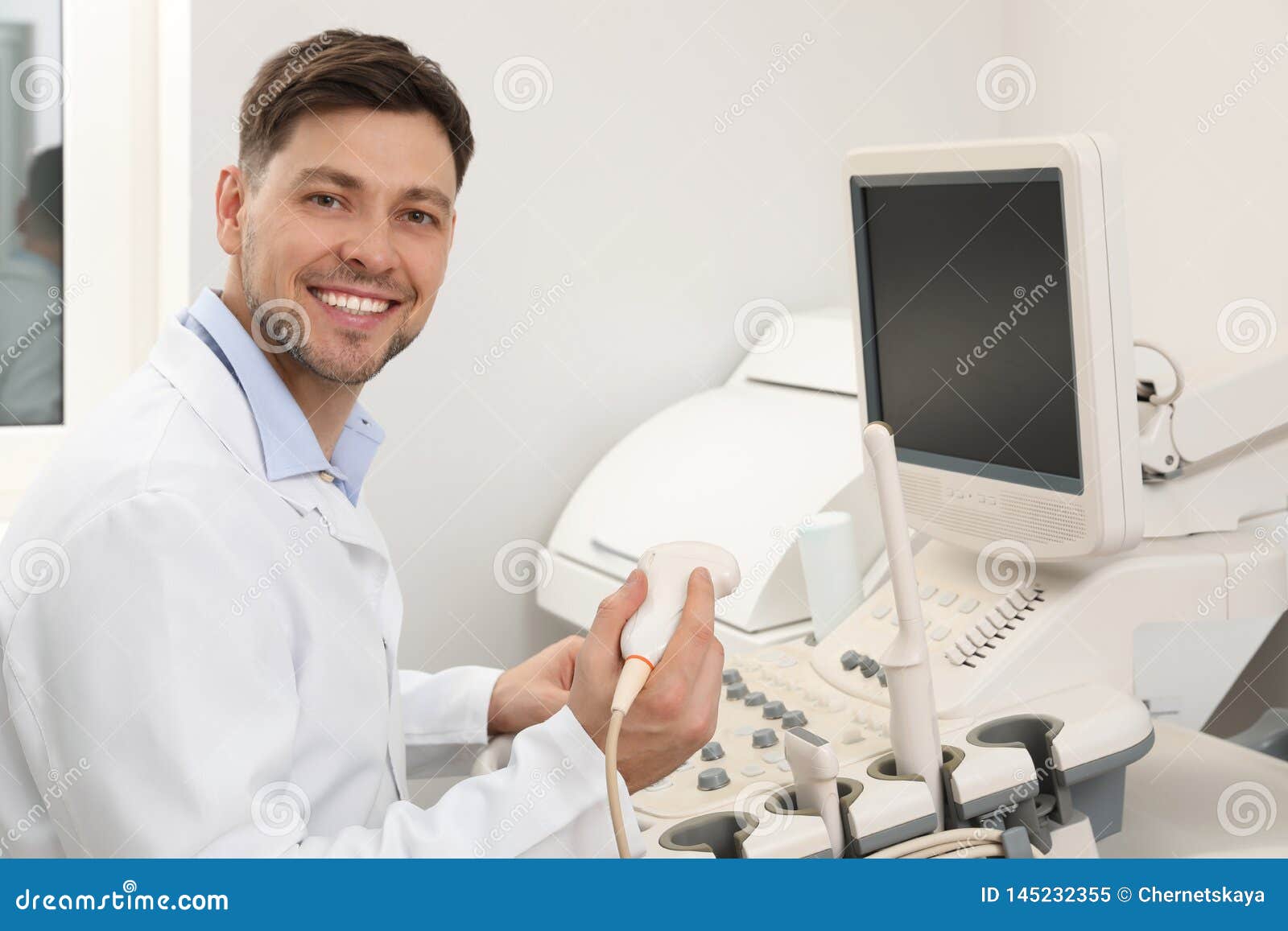 Sonographer Operating Modern Ultrasound Machine Stock Image - Image of ...