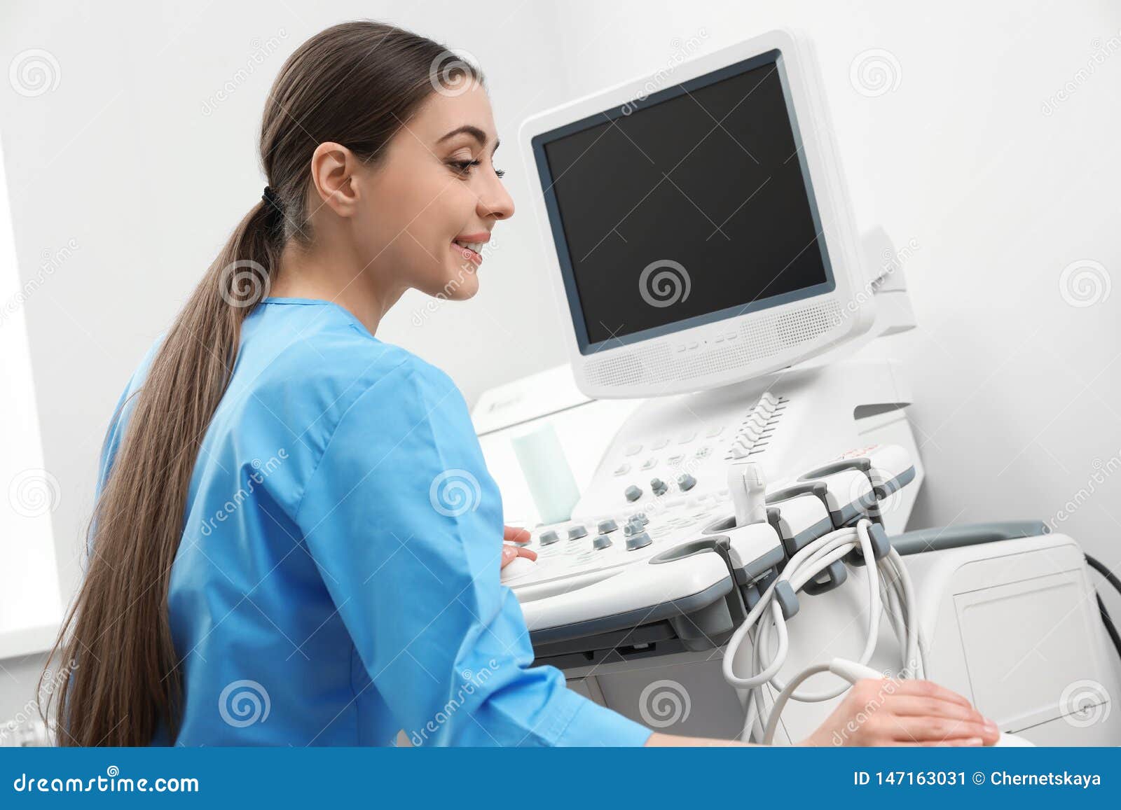 Sonographer Operating Modern Ultrasound Machine Stock Image - Image of ...