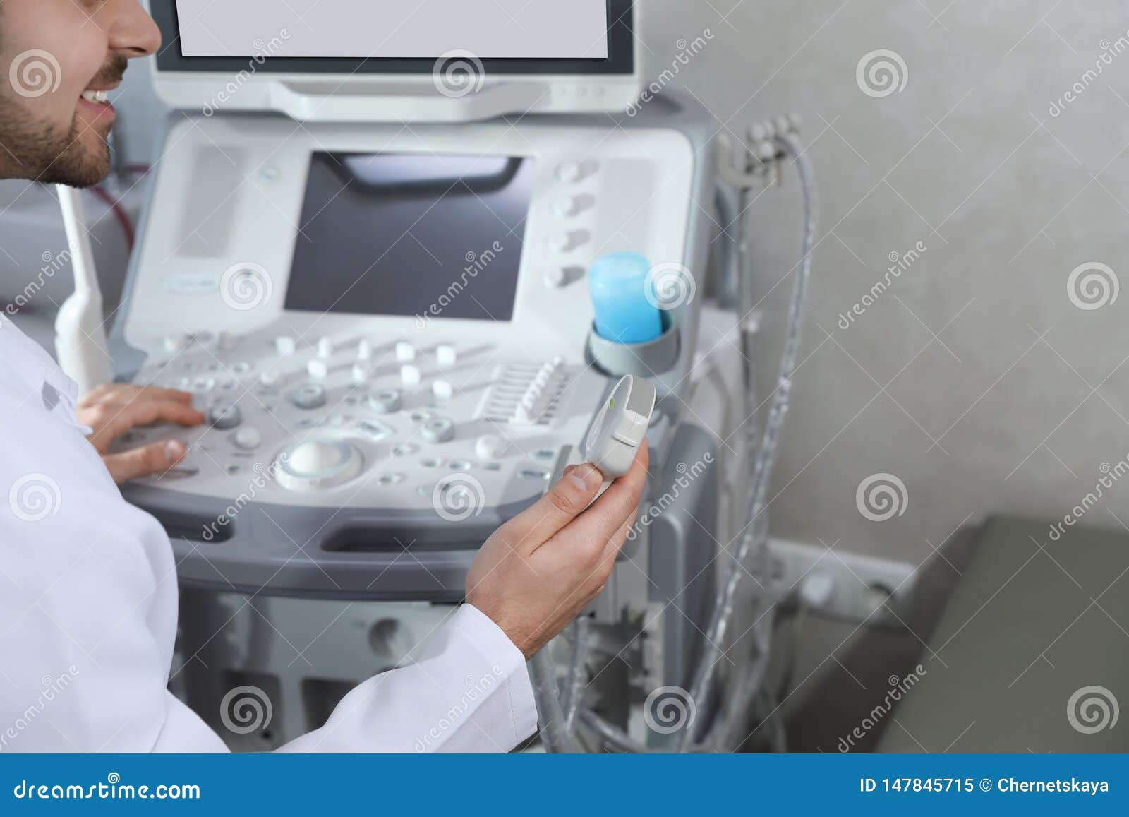 Sonographer Using Modern Ultrasound Machine in Clinic Stock Image ...