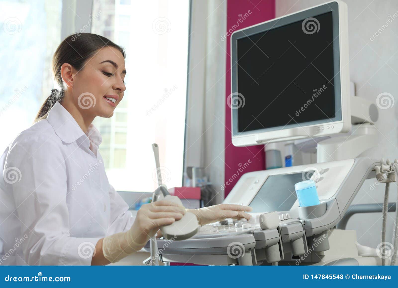 Sonographer Using Modern Ultrasound Machine Stock Photo - Image of ...