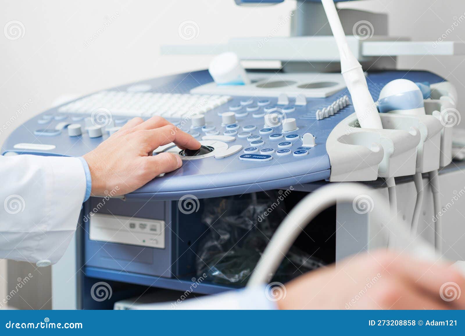 Sonographer Using Ultrasound Machine at Work. Stock Photo - Image of ...