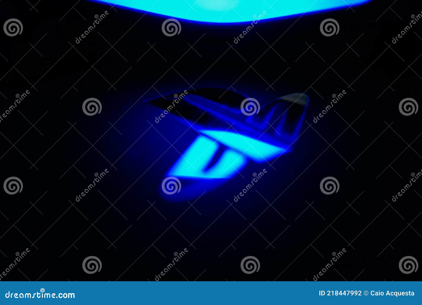 Sony Playstation Logo Illuminated on Blue Light from Game Controller ...