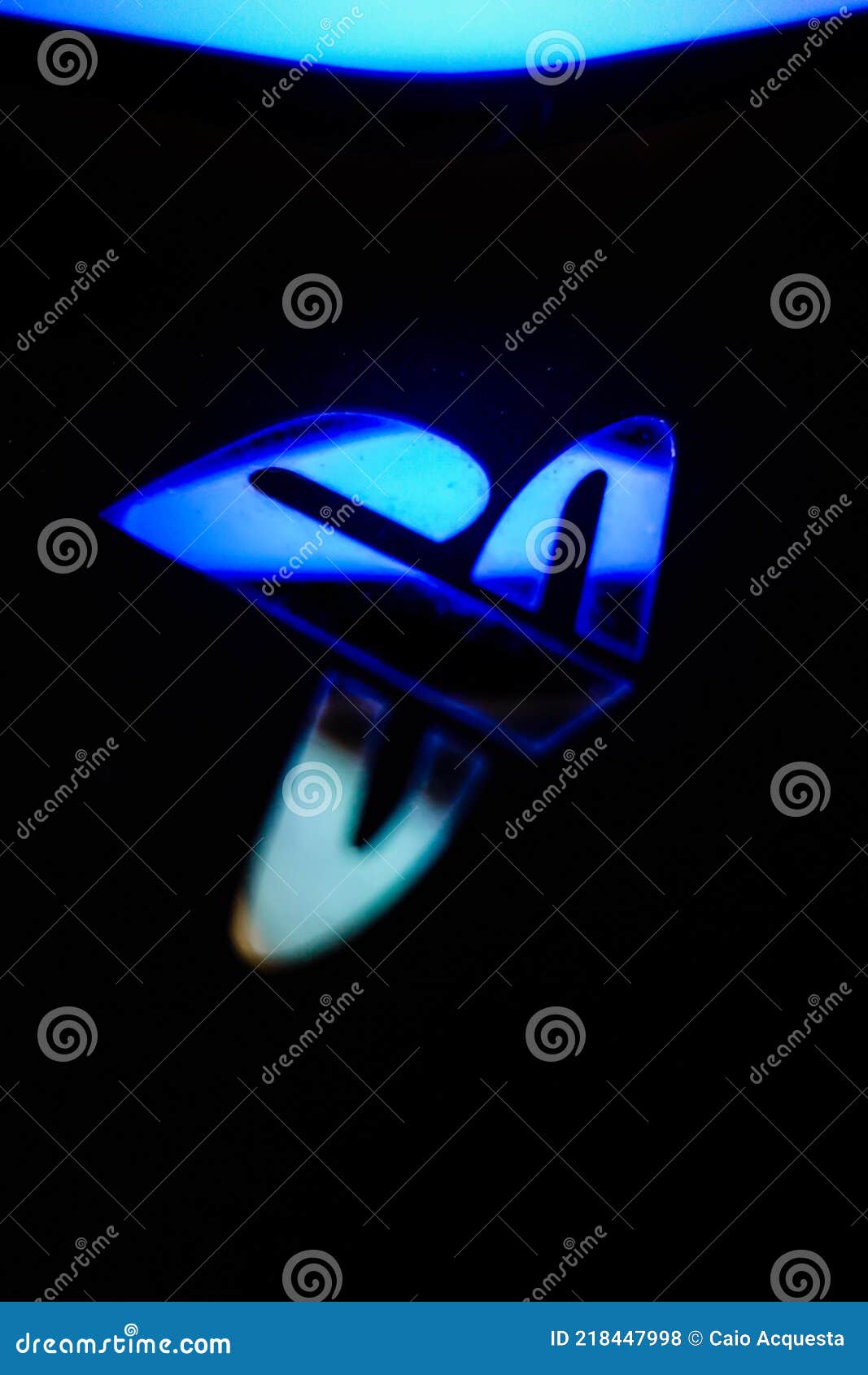 Sony Playstation Logo Illuminated on Blue Light from Game Controller ...