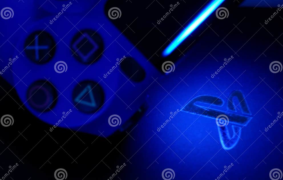 Sony Playstation Logo Illuminated on Blue Light from Game Controller ...