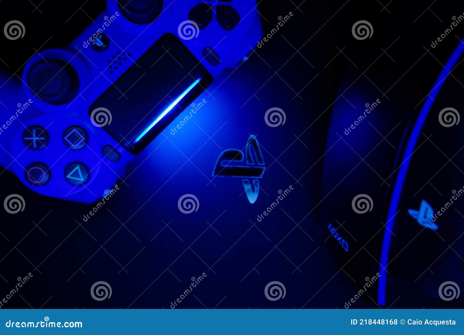 Sony Playstation Logo Illuminated on Blue Light from Game Controller ...