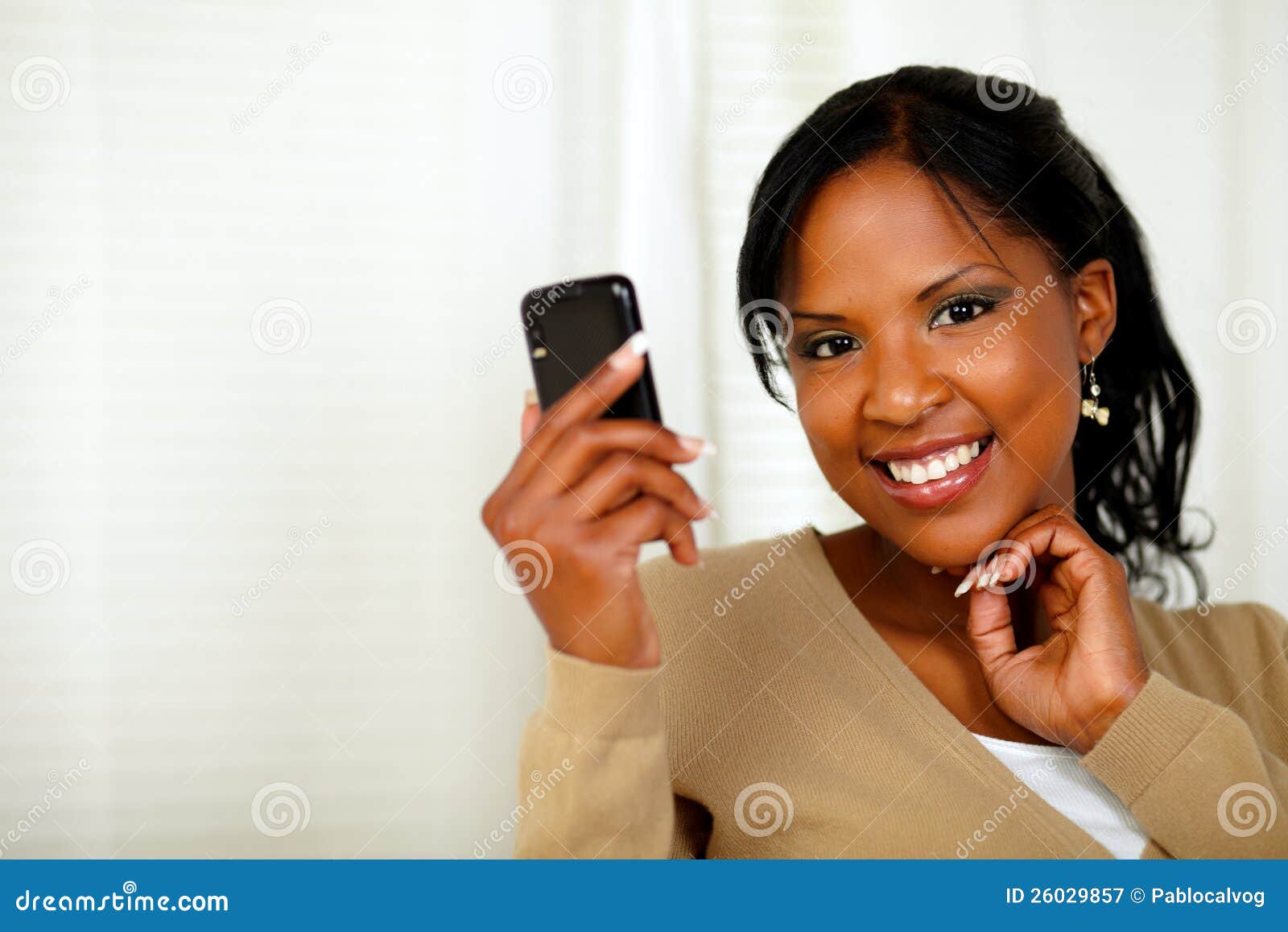 Sophisticated Lady Reading a Message on Cellphone Stock Image - Image ...
