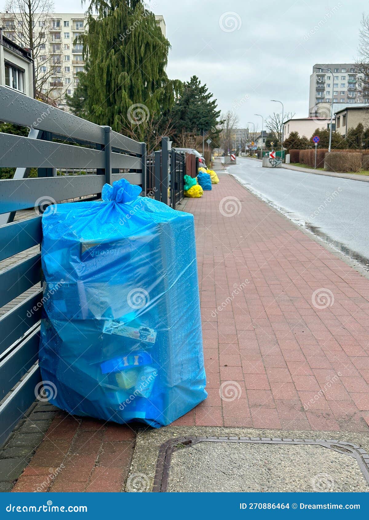 Sorted Garbage in Plastic Bags Ready for Collection by the Garbage ...