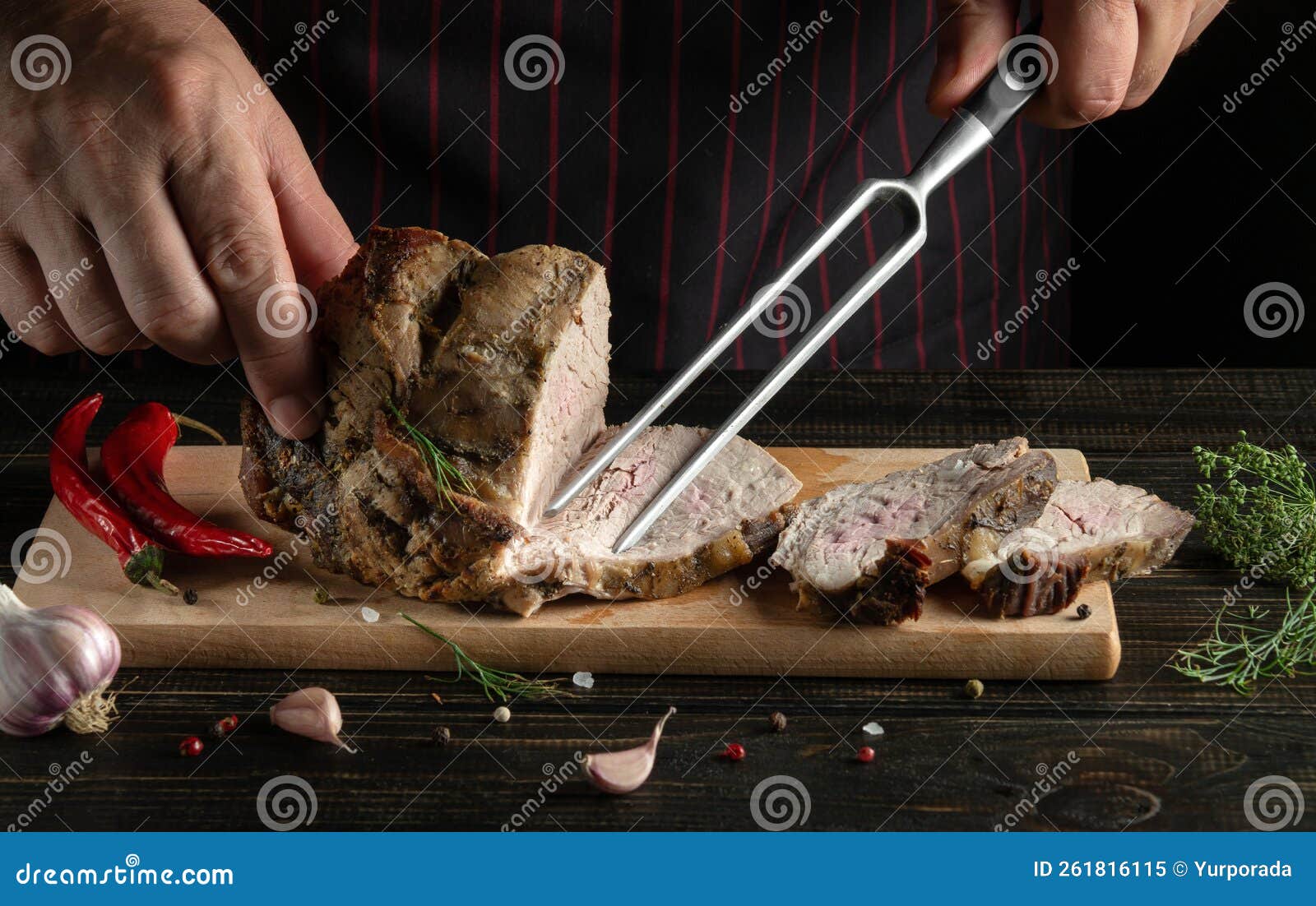 Sorting Grilled Meat by the Chef`s Hands for Tasting. Fork in the Chef ...