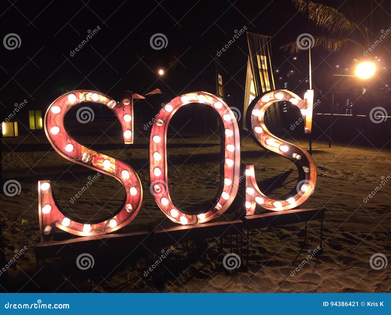 SOS stock image. Image of beach, letters, bali, night - 94386421