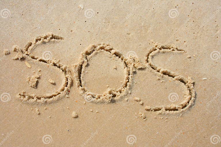 SOS in the sand stock photo. Image of easy, written, spelled - 1037024