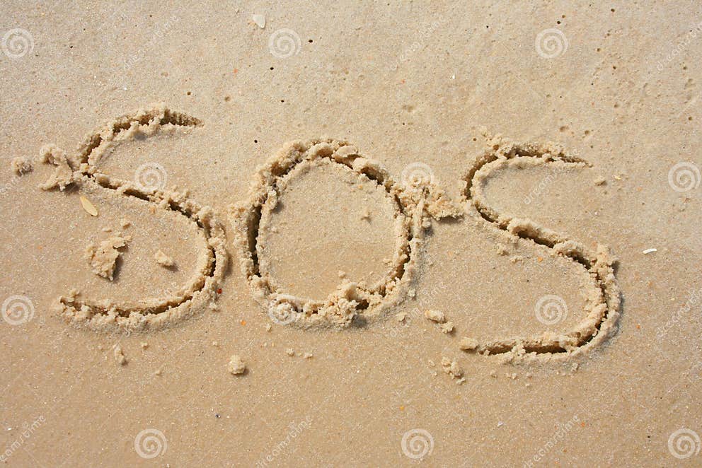 SOS in the sand stock photo. Image of easy, written, spelled - 1037024