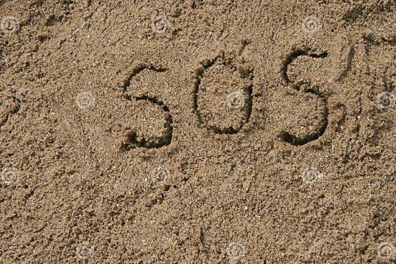 SOS writing on sand stock photo. Image of beaches, writing - 698632