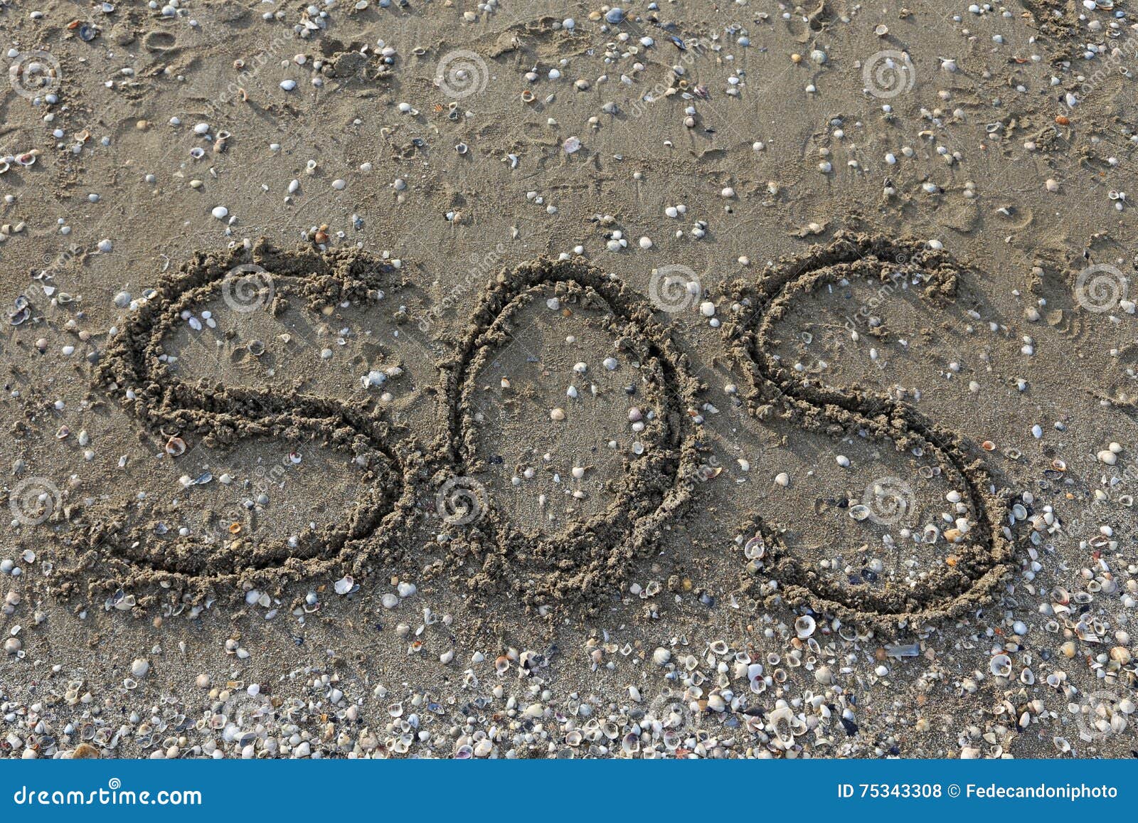 Sos written on the beach stock photo. Image of beach - 75343308