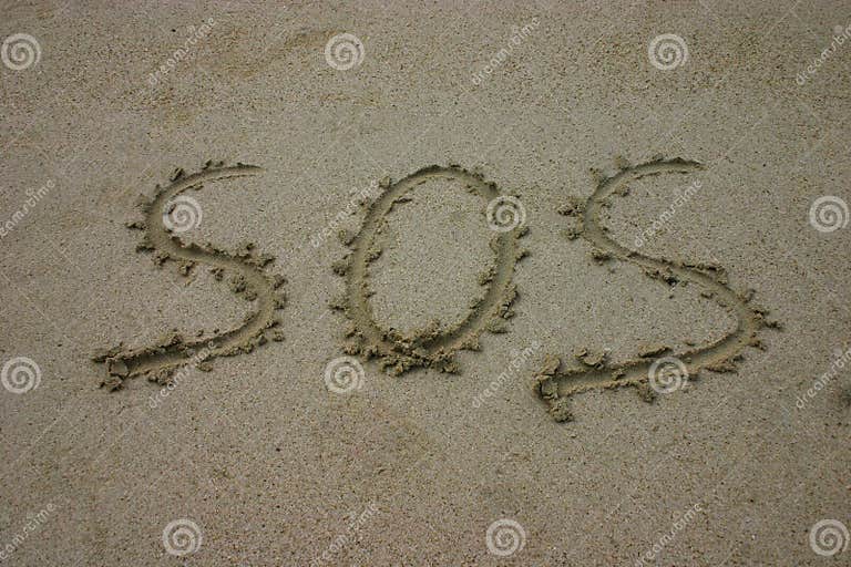 SOS written in sand stock photo. Image of ocean, help - 20136350