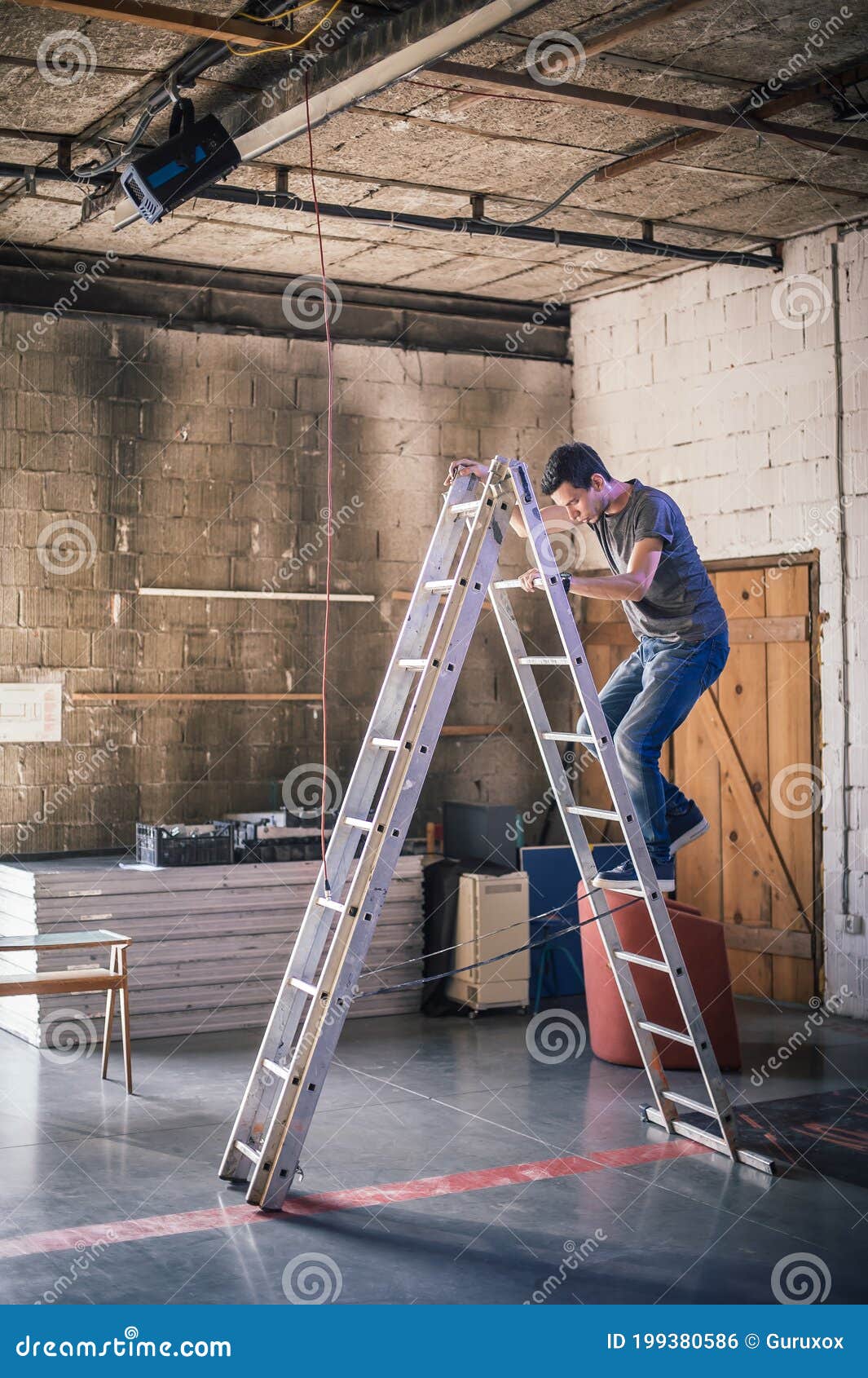 Sound Engineer is Connecting the Audio Cables in the Theater Stock ...