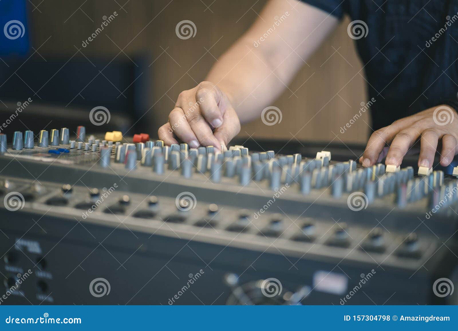 Sound Engineer or Dj is Adjusting the Volume Stock Photo - Image of ...