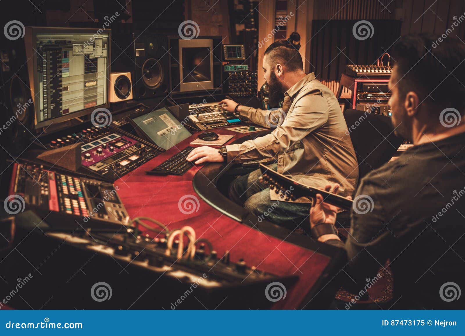 Sound Engineer Music Producer Adjusting And Balancing Audio On Rock ... Sound Engineer Music Producer Adjusting And Balancing Audio On Rock ...