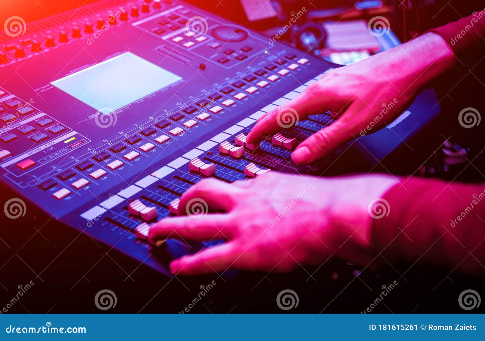 Sound Engineer Working at Mixing Panel in the in Sound Recording Studio ...