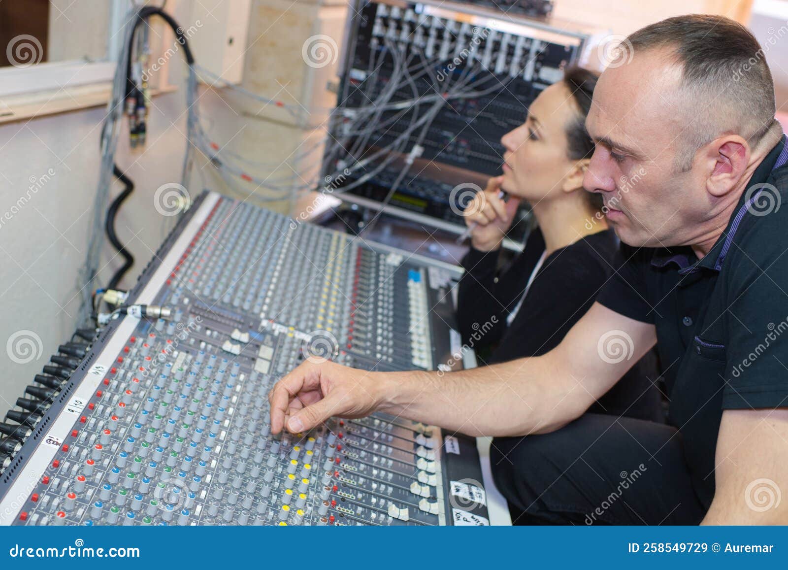Sound Engineers Working at Mixing Panel in Recording Studio Stock Image ...