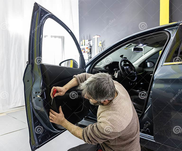 Sound Insulation of the Car. Installation of Sound Insulation Material ...