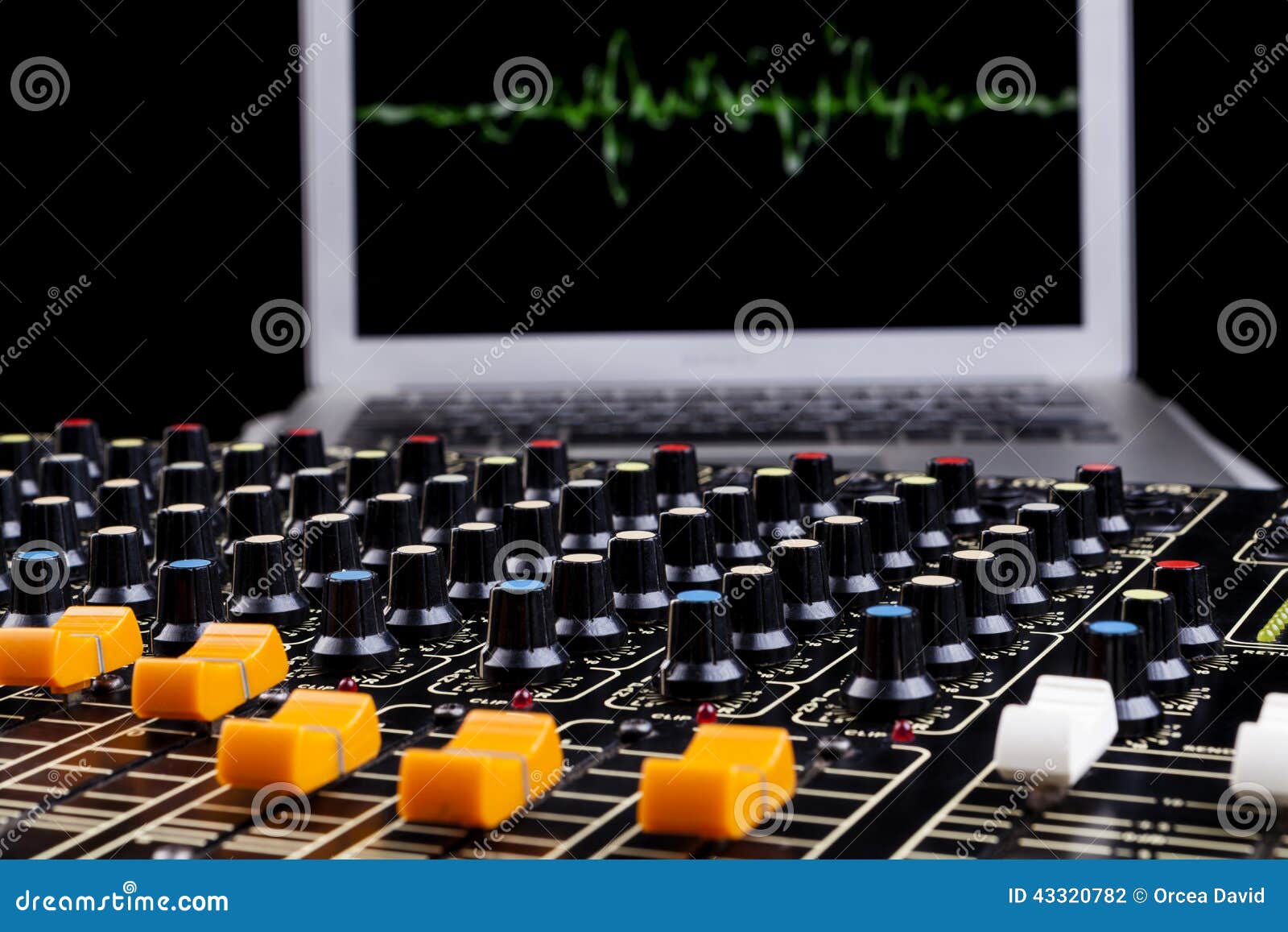 Analog Studio Sound Mixer Closeup With Laptop And Sound Wave Form In ...