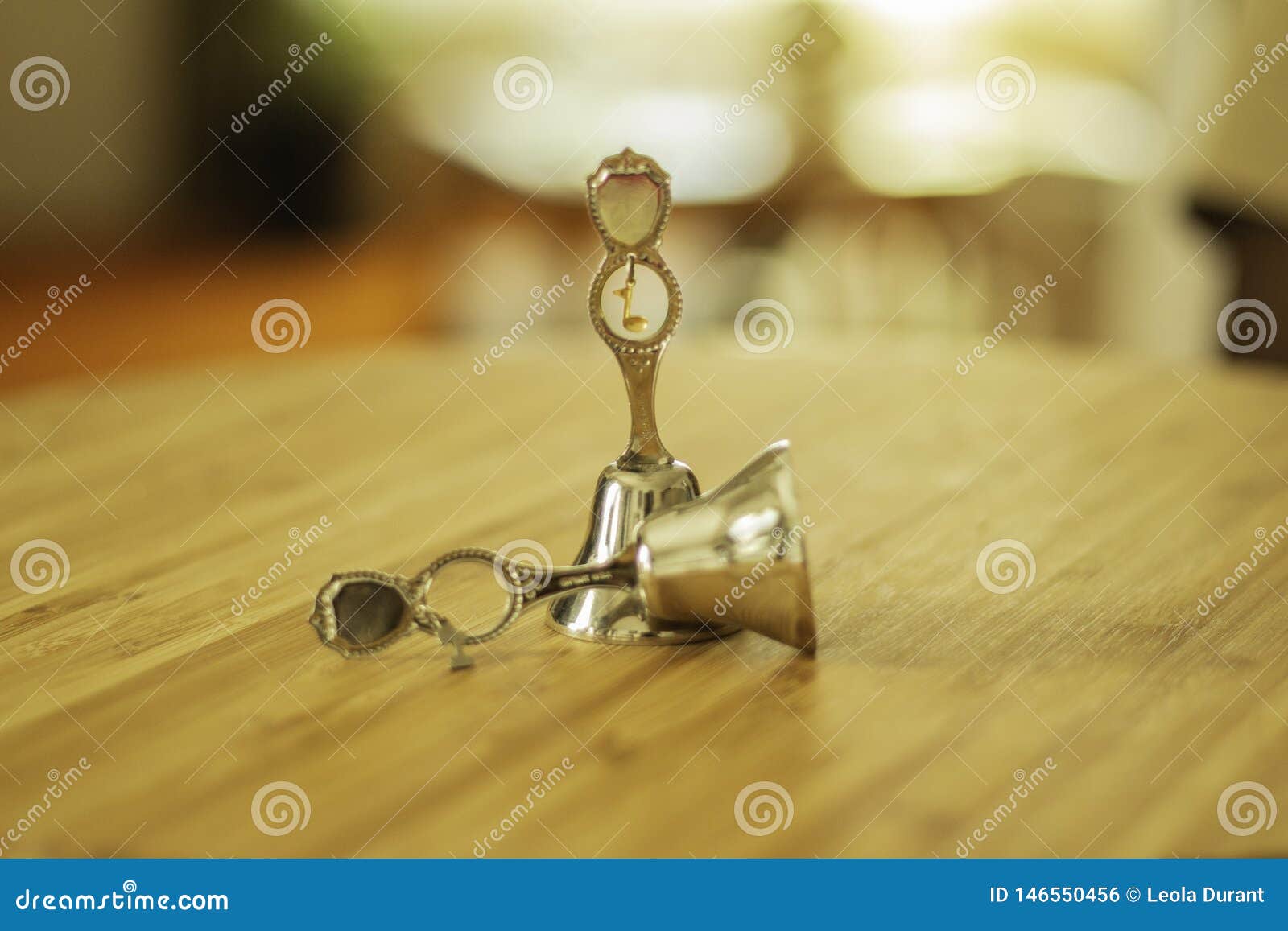 Sounding the Bell for Dinner Stock Photo - Image of bells, flat: 146550456