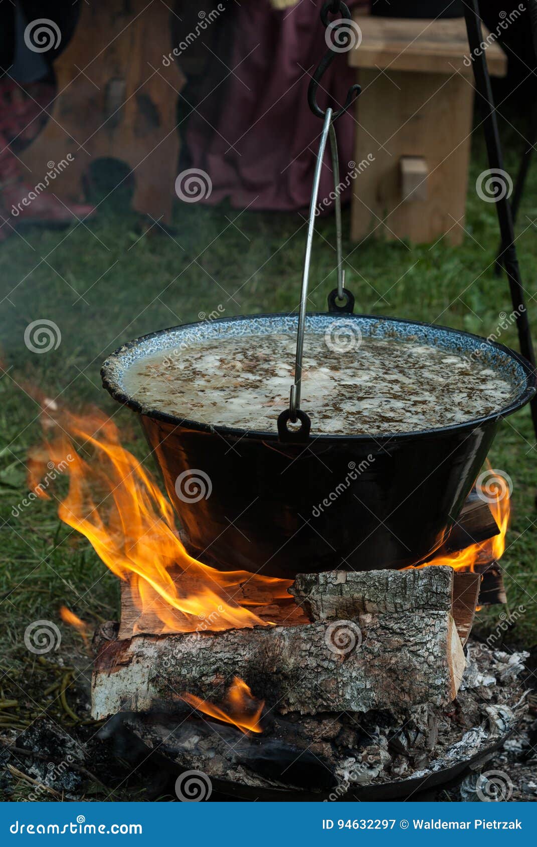 Soup cooked on fire stock image. Image of wood, fire - 94632297