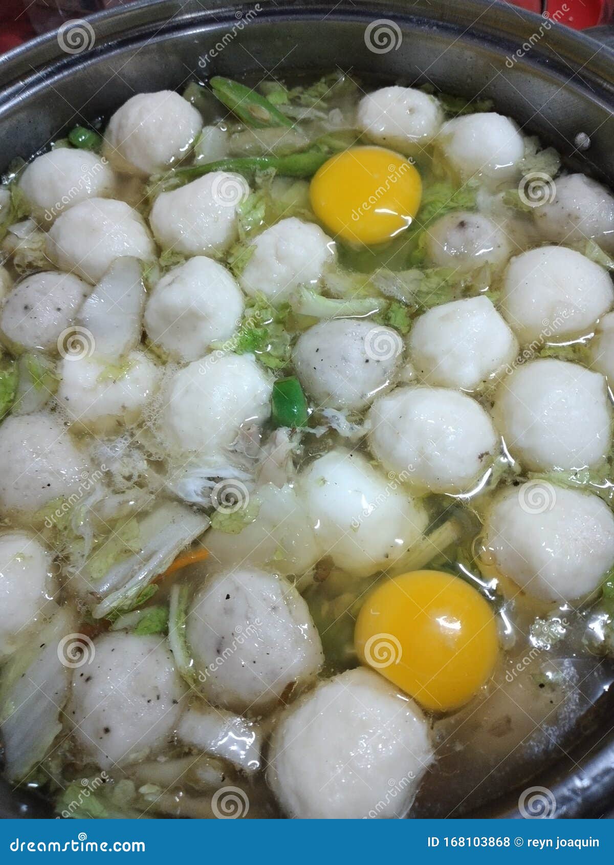 Soup with Fresh Eggs, Chicken and Squid Balls Stock Photo - Image of ...