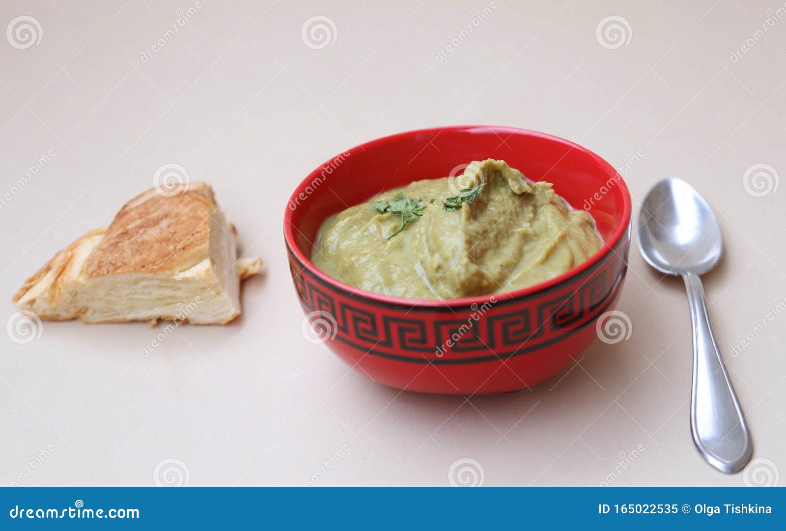 Soup Strained with Broccoli on a Table, a Spoon and a Piece of Fresh ...