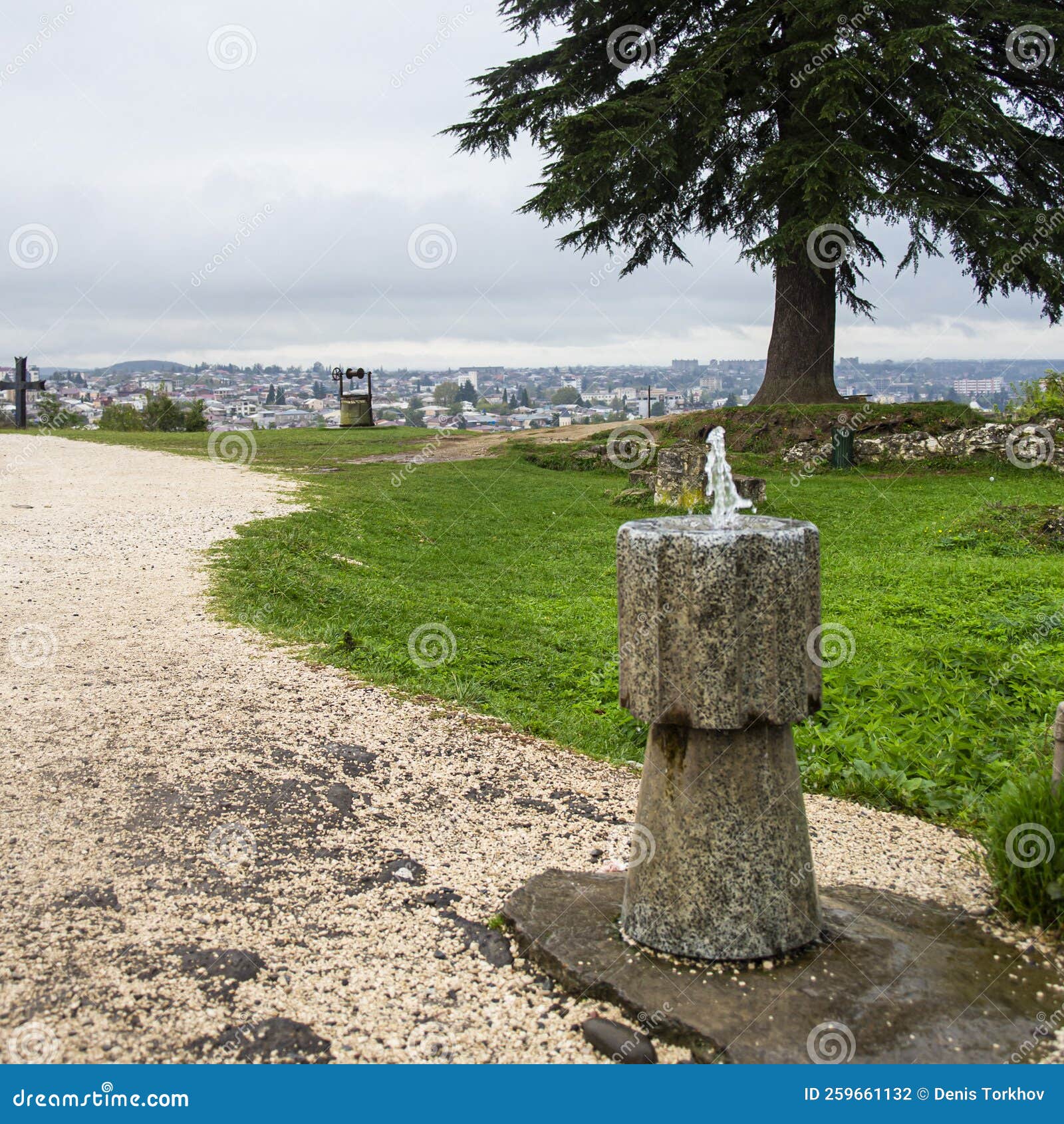 A Source of Drinking Water from a Natural Stone Tap, Against the ...