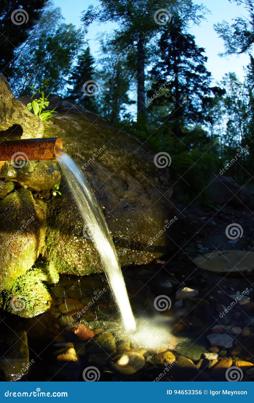 The Source of Natural Water, Wellspring, Flowing through Rocks in ...