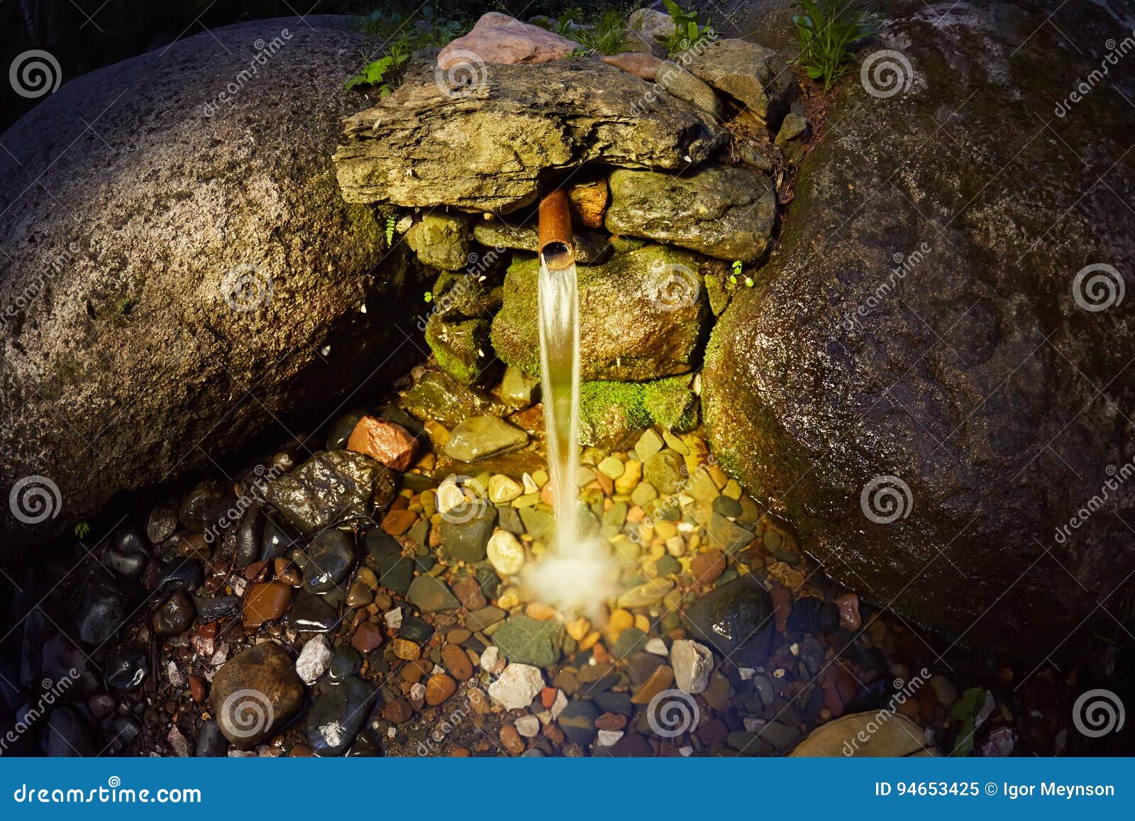 The Source of Natural Water, Wellspring, Flowing through Rocks in ...