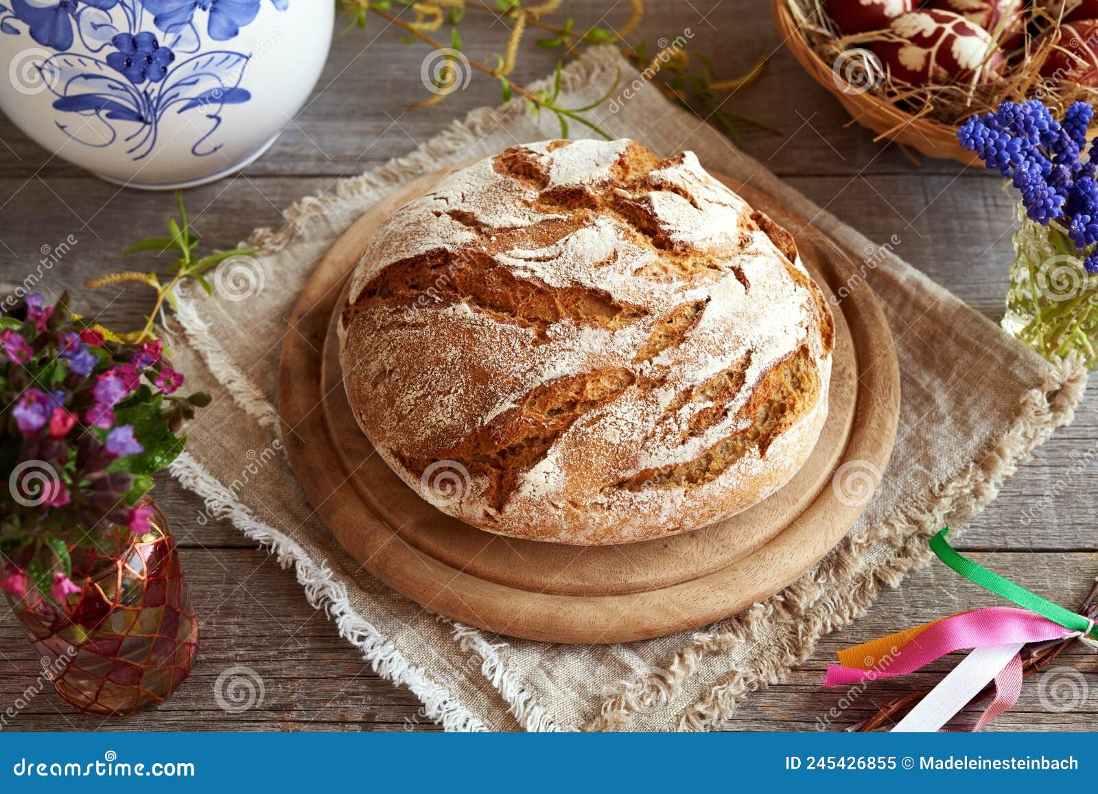 Sourdough Bread with Spring Flowers and Easter Eggs Stock Image - Image ...