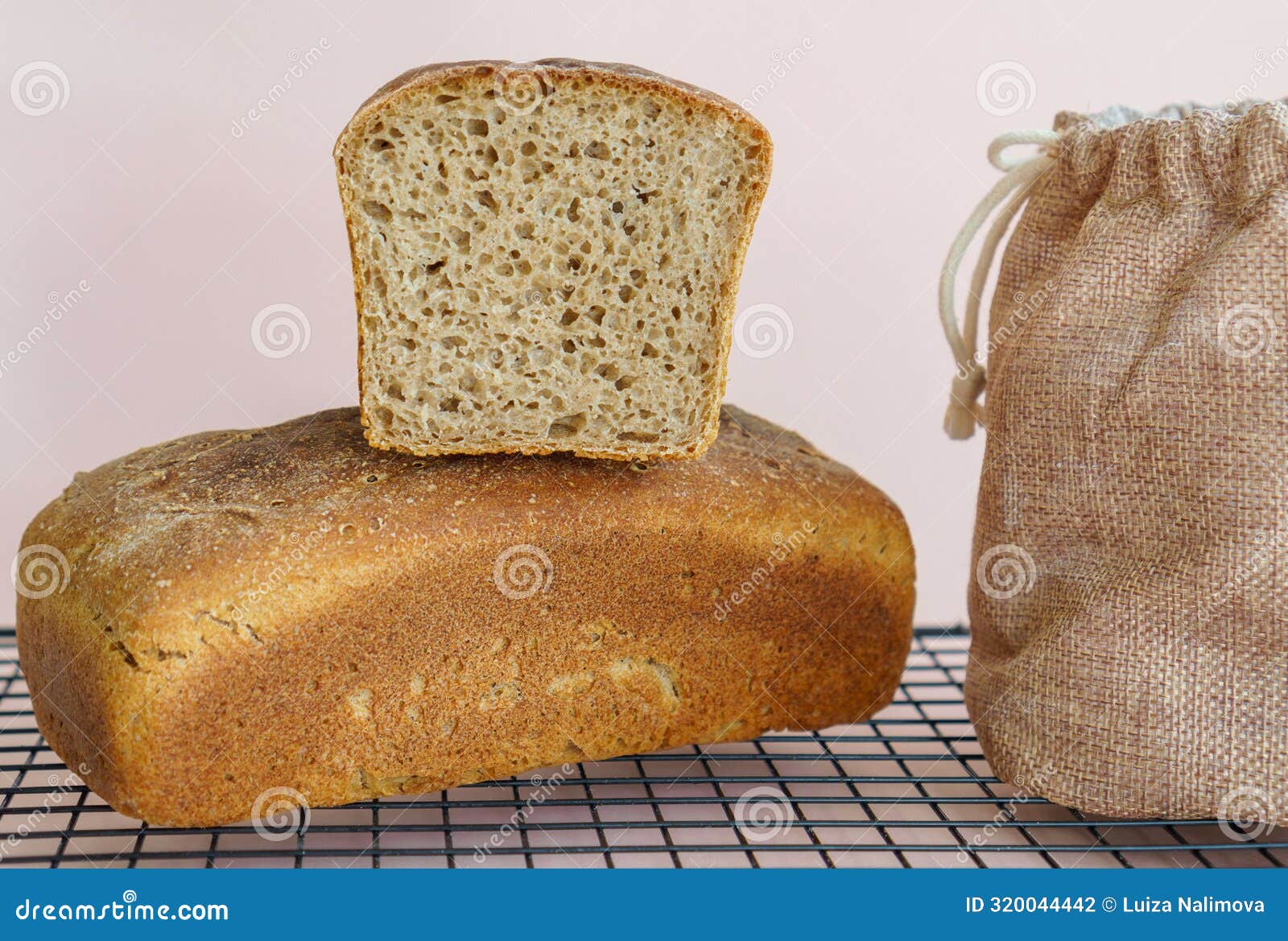 Sourdough Rye Bread Rectangular Brick Shape. a Canvas Bag of Flour on a ...