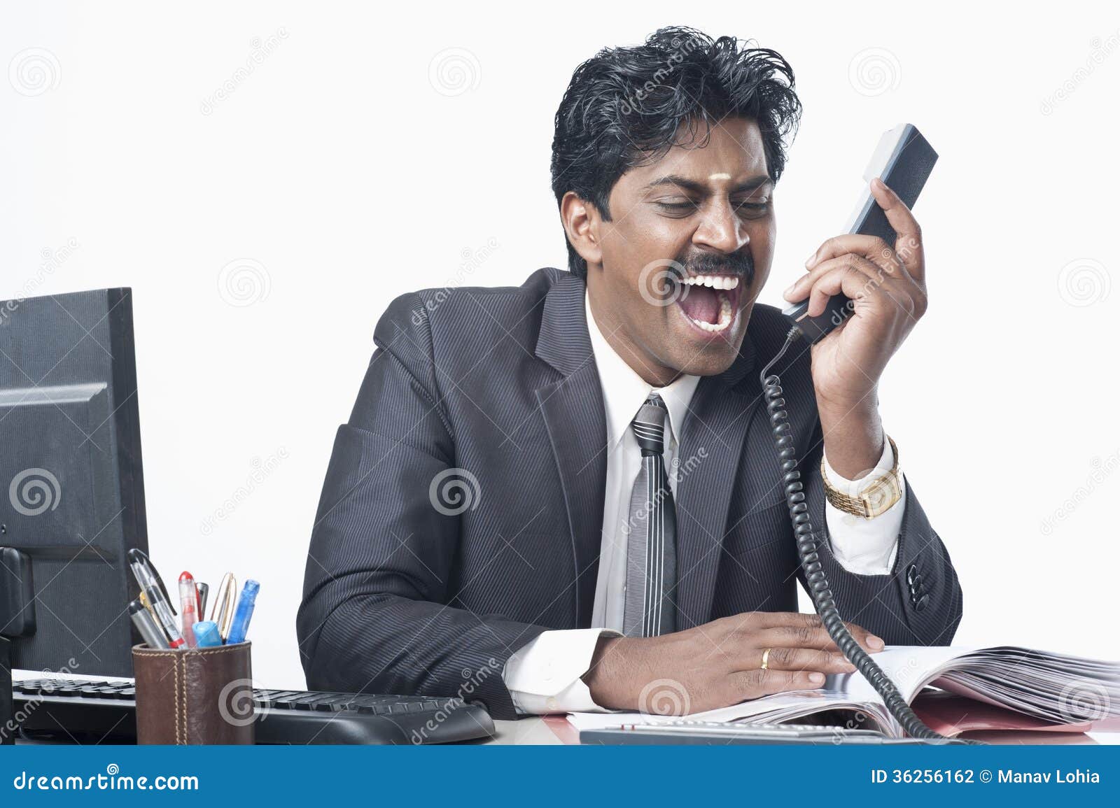 South Indian Businessman Working in an Office and Shouting Stock Photo ...
