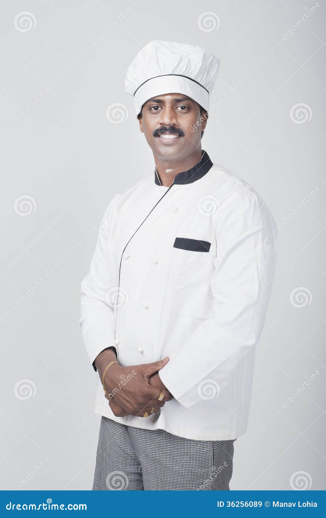 South Indian Chef Standing with His Hands Clasped and Smiling Stock ...
