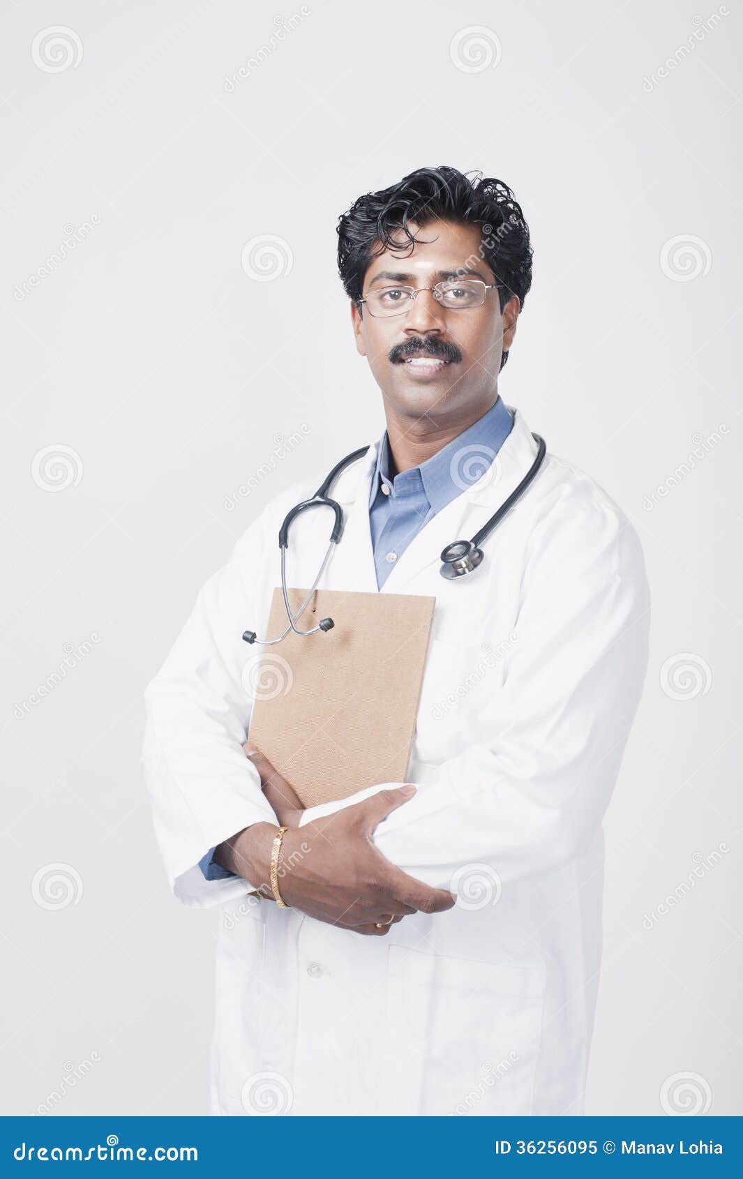 South Indian Doctor Smiling Stock Image - Image of arms, ethnicity ...