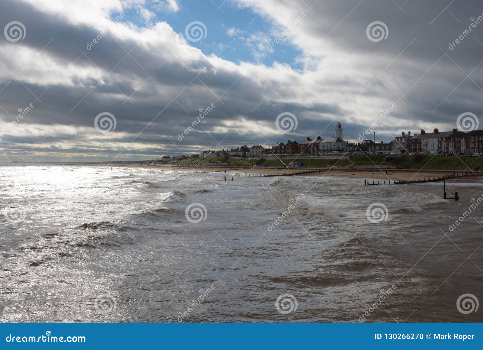 Southwold Seafront with Bright Sun and Big Waves Stock Photo - Image of ...