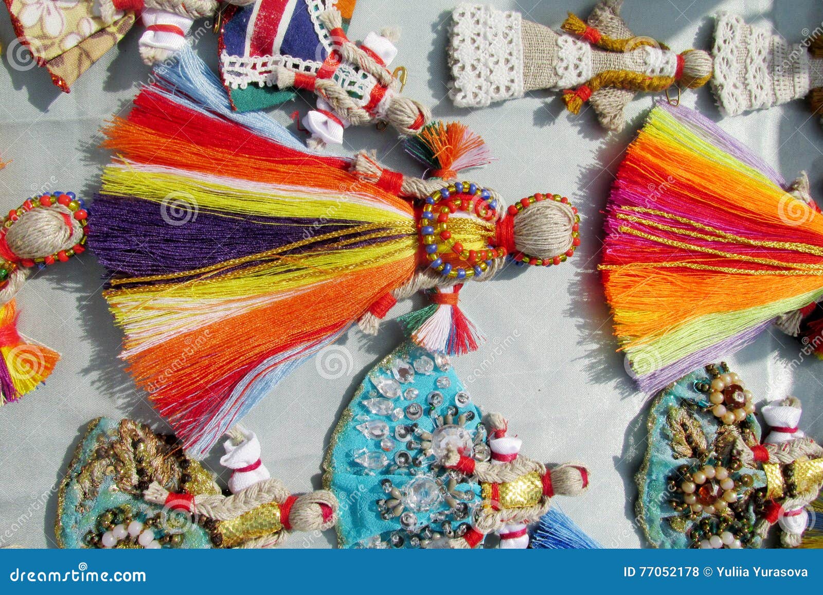 Souvenir thread dolls editorial stock photo. Image of market - 77052178