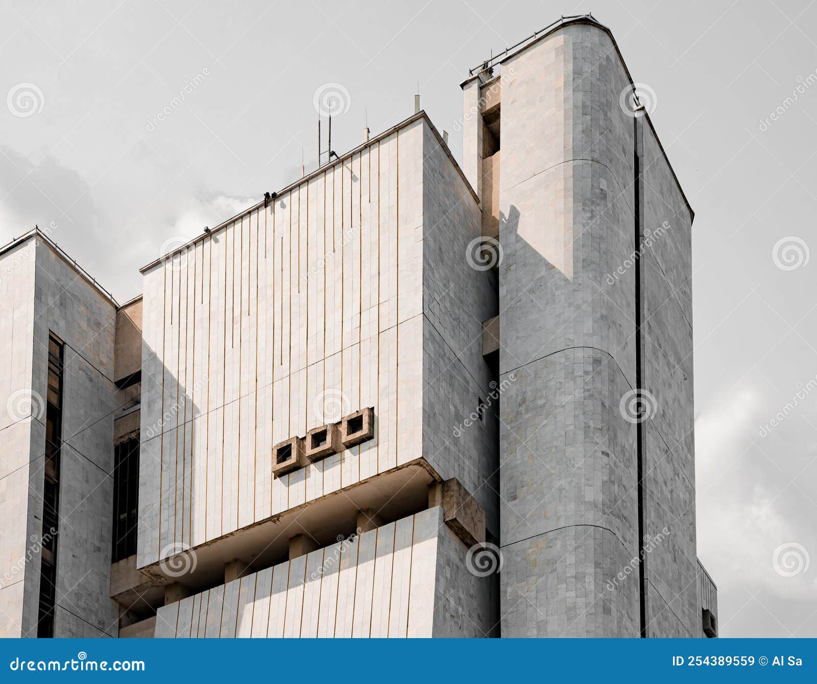 Soviet Brutalist Architecture. High Gray Walls with Small Windows Stock ...