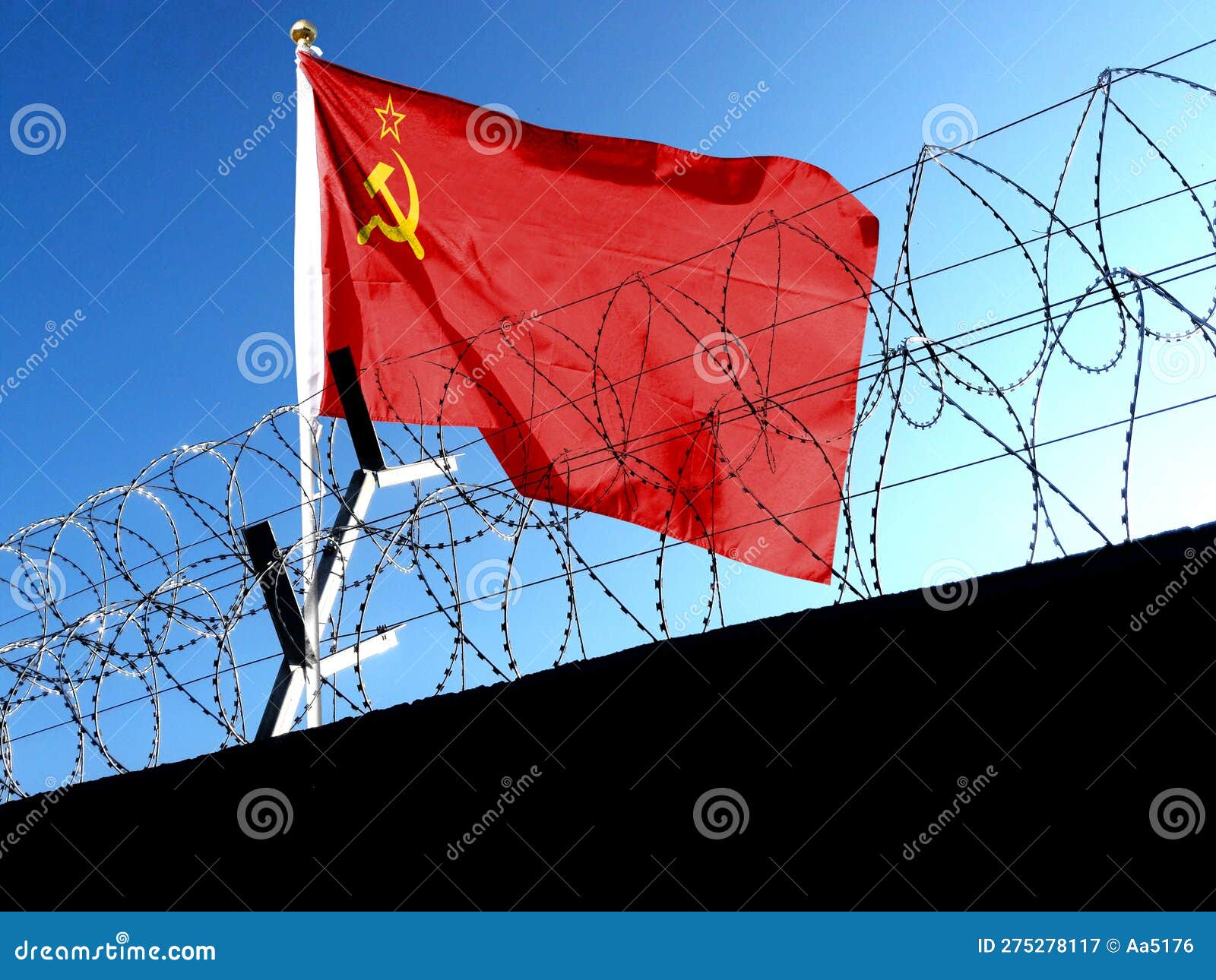 The Soviet Union Flag Hangs in the Cloudy Sky Outside the Prison S ...
