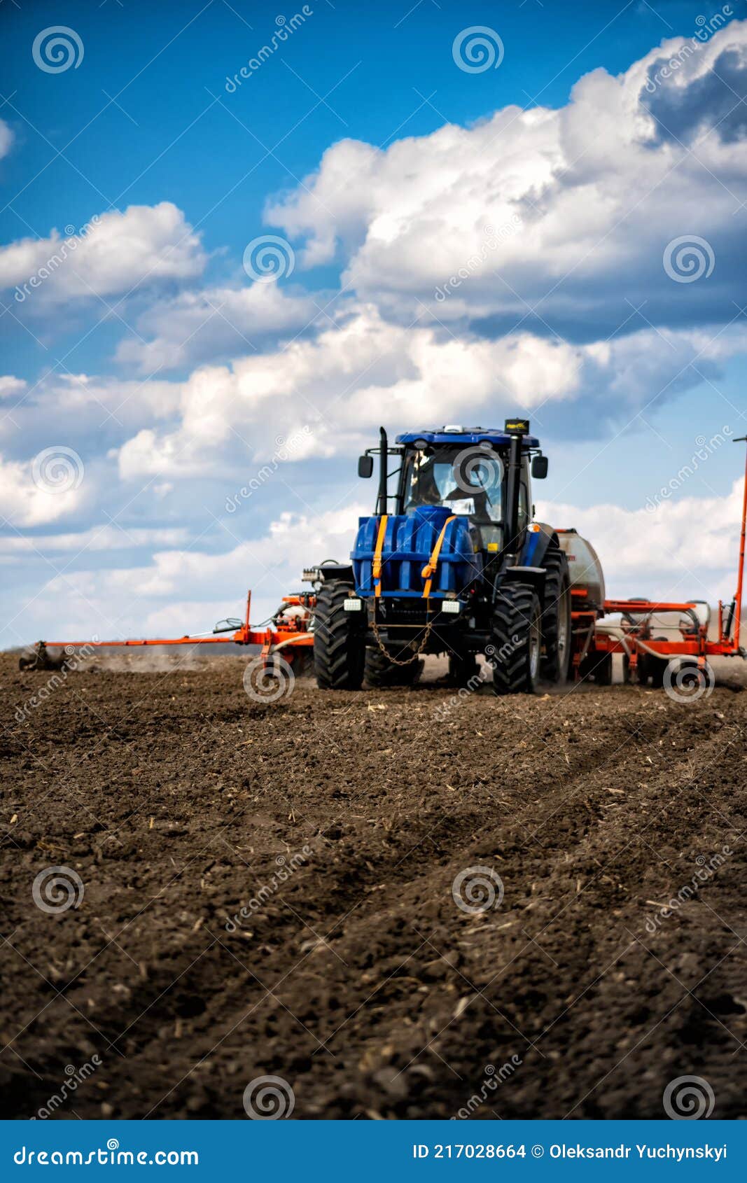 Sowing Work in the Field. Tractor with Seeder Stock Photo - Image of ...
