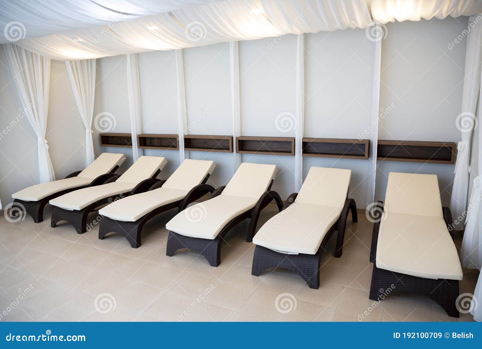 Spa deck chairs relaxation stock image. Image of holiday - 192100709