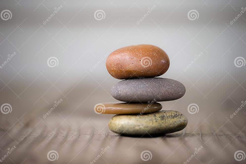 Spa Rocks in a Stack on Wood Surface Stock Image - Image of smooth ...