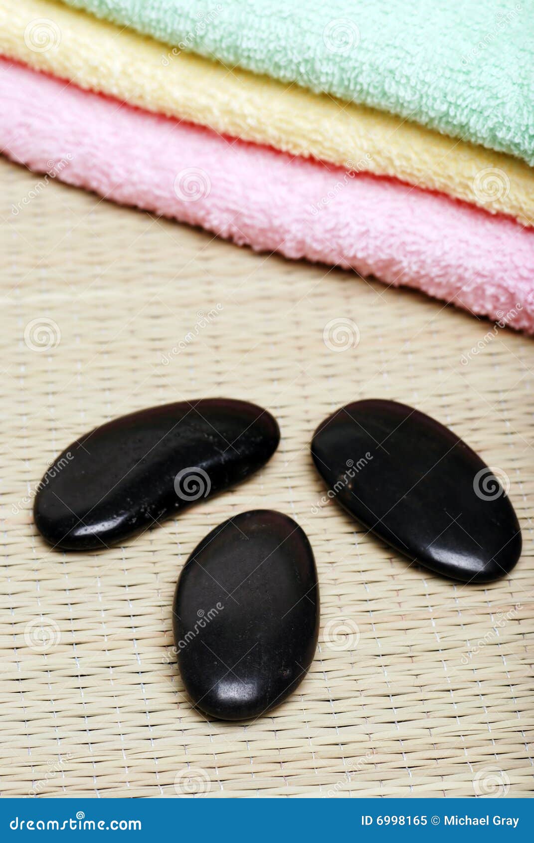 Spa rocks with towels stock image. Image of yellow, stones - 6998165