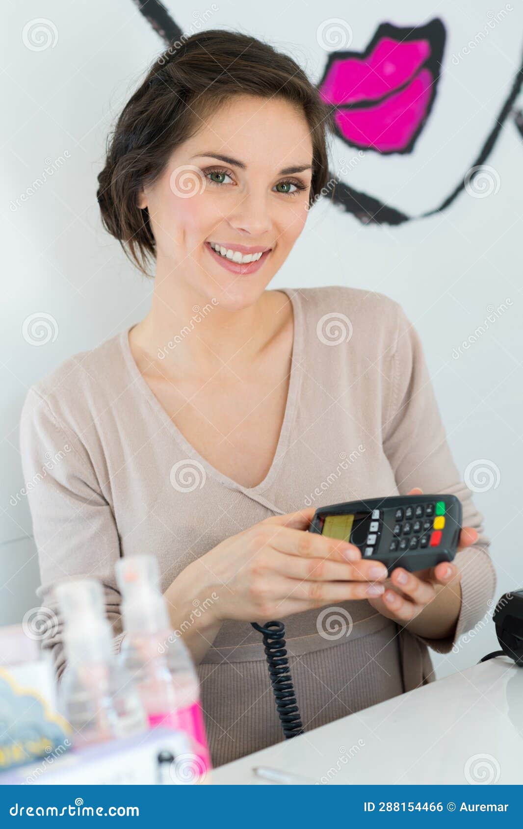 Spa or Salon Worker Holding Card Reading Machine Stock Photo - Image of ...